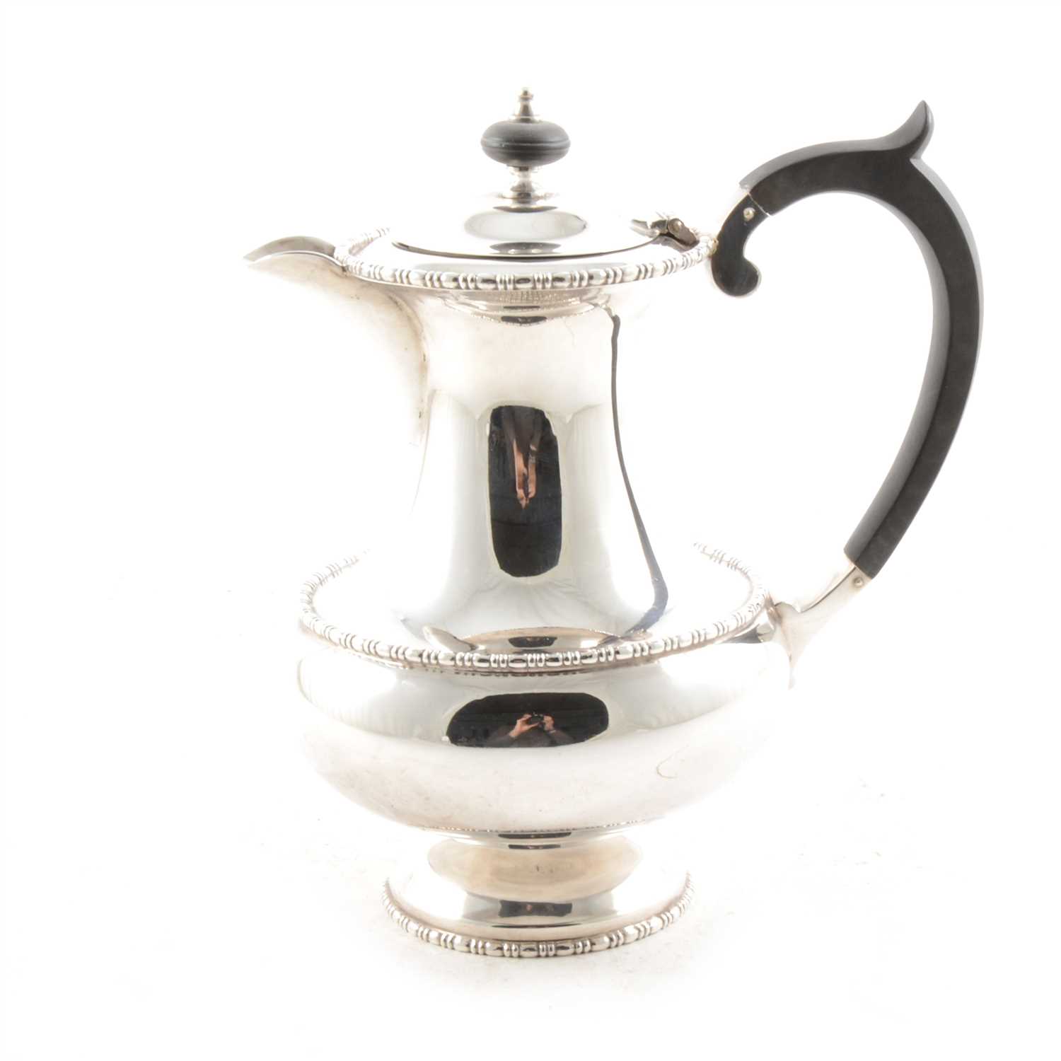 Lot 424 - A silver coffee pot in the Queen Anne style